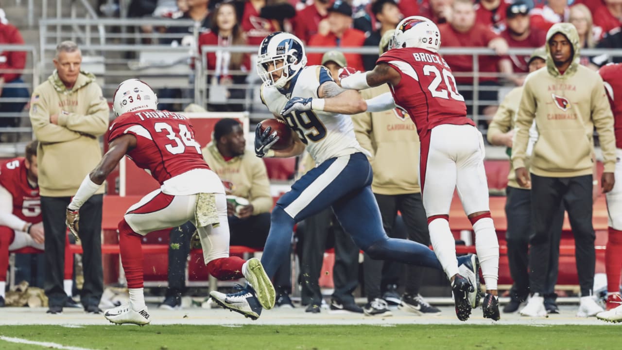 Tyler Higbee throws nasty stiff arm, tight ropes down sideline for 26 yards