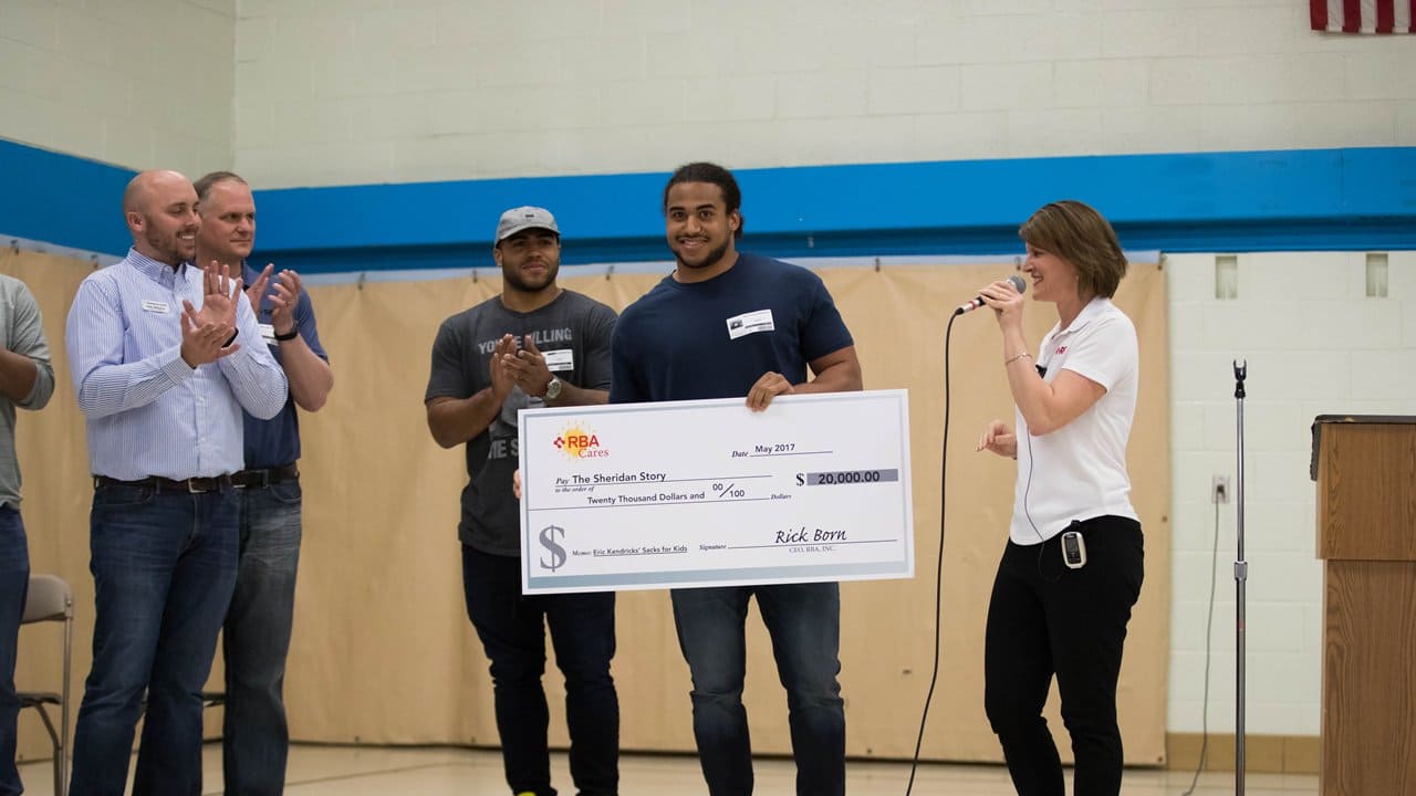 Eric and Mychal Kendricks Present $20,000 Check to Fight Childhood Hunger