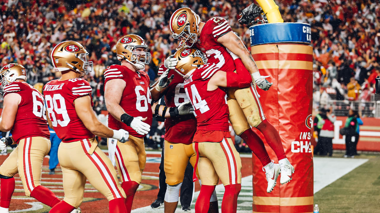 Christian McCaffrey Lunges into the End Zone for a Touchdown
