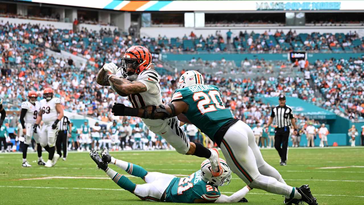 Brown's stop, skirt, and scamper ends with a 9-yard goal-line leap for ...