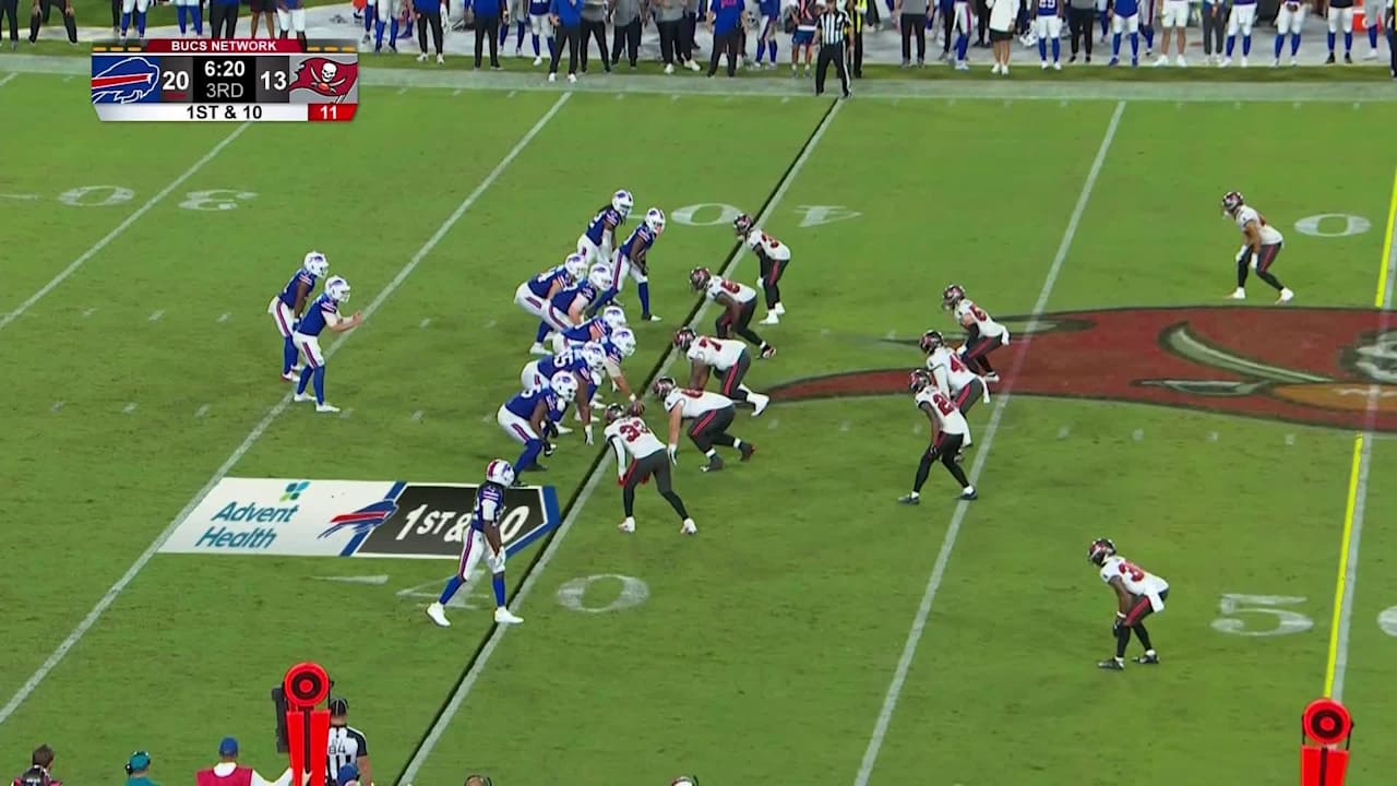 Zach Davidson thunders ahead for a 20-yard gain after Shane Buechele's pass