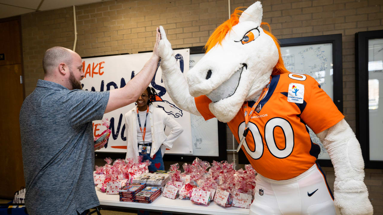 Photos: Broncos hand out Valentine's Day gift bags to ESS educators for ...