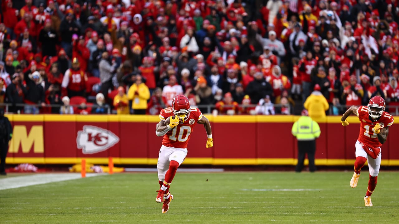 Kansas City Chiefs running back Isiah Pacheco hits the hole and bursts ...