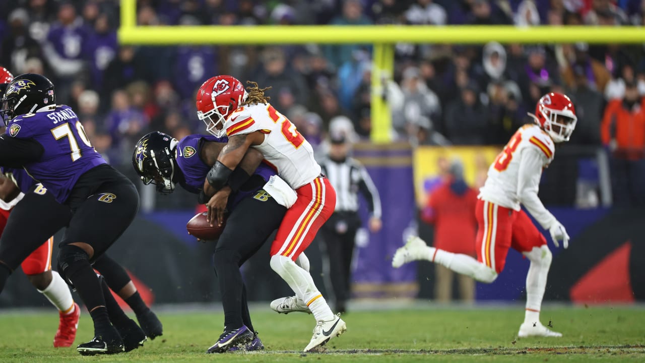 Kansas City Chiefs safety Justin Reid engulfs Baltimore Ravens quarterback Lamar Jackson for ...