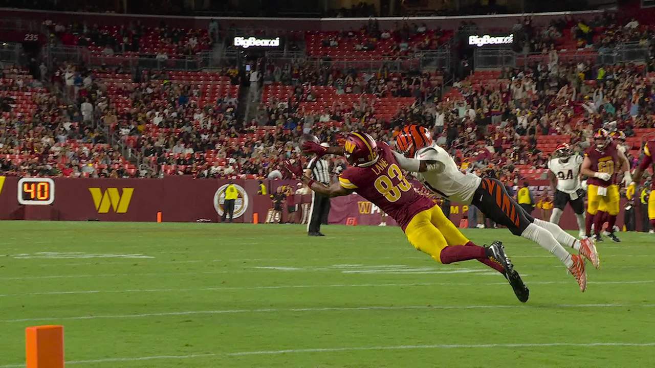 Hartman somehow connects with Jaylin Lane on tight-window spiral