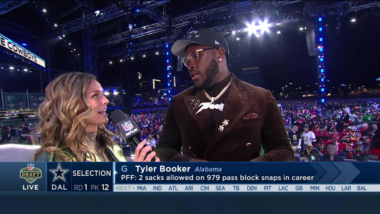 OL Tyler Booker reacts to being drafted No. 12 overall by the Dallas ...