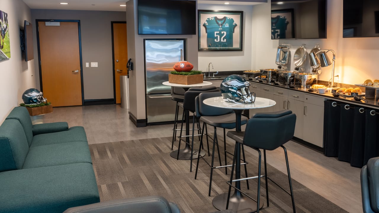 Hybrid Layout: One (1) three-person couch; Two (2) high top cocktail ...