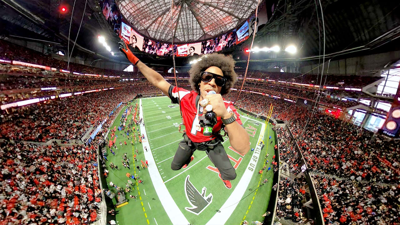 Behind-the-Scenes | Ludacris Rappels from Roof during 50th Anniversary ...