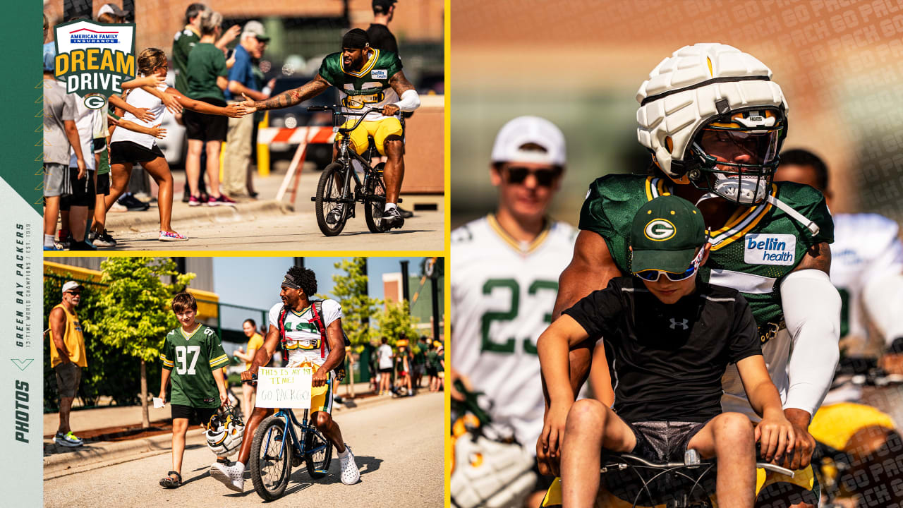 Photos: Packers fans cheer on players en route to practice