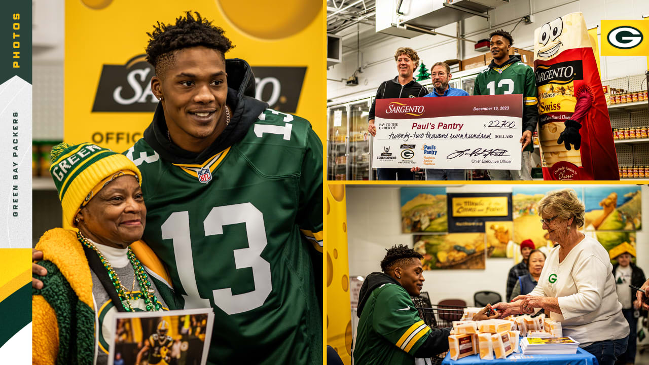 Photos: Packers WR Dontayvion Wicks attends 'Touchdowns for Hunger' event