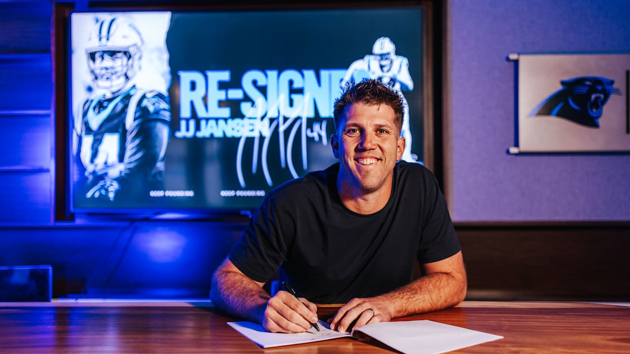 PHOTOS: J.J. Jansen officially re-signs with Carolina
