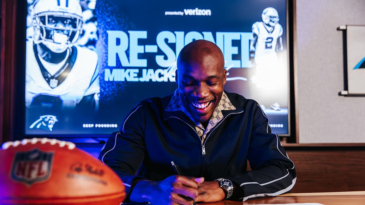 PHOTOS: Mike Jackson officially re-signs with the Panthers