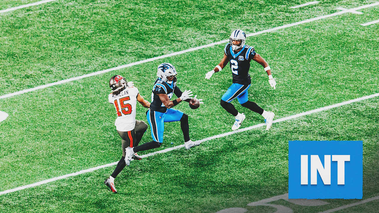 Xavier Woods picks off Mayfield's pass and returns it deep into Bucs' territory