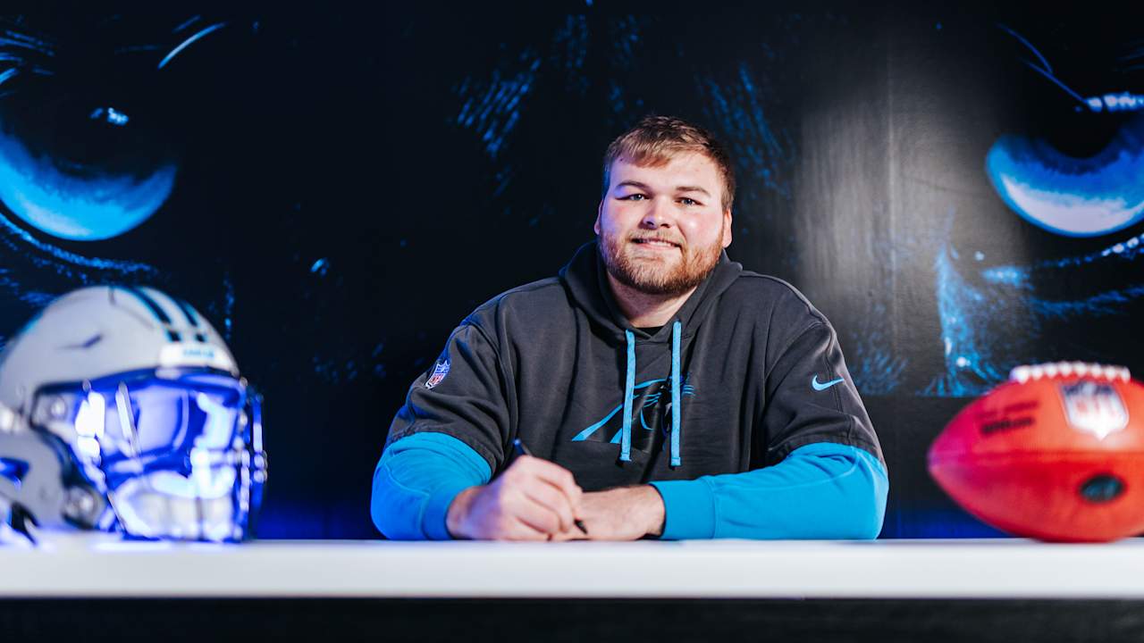 PHOTOS: Cade Mays officially re-signs with the Panthers