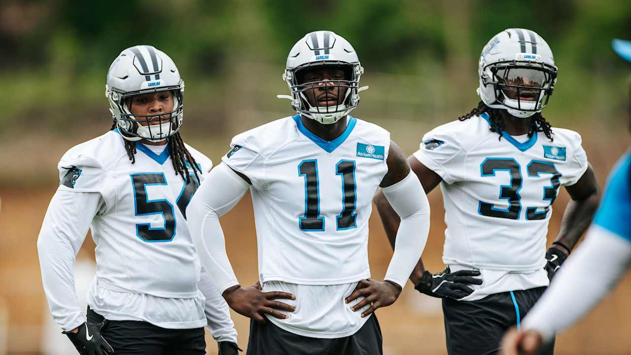 In a hotel meeting room, Panthers' rookie pass-rushers forge a future