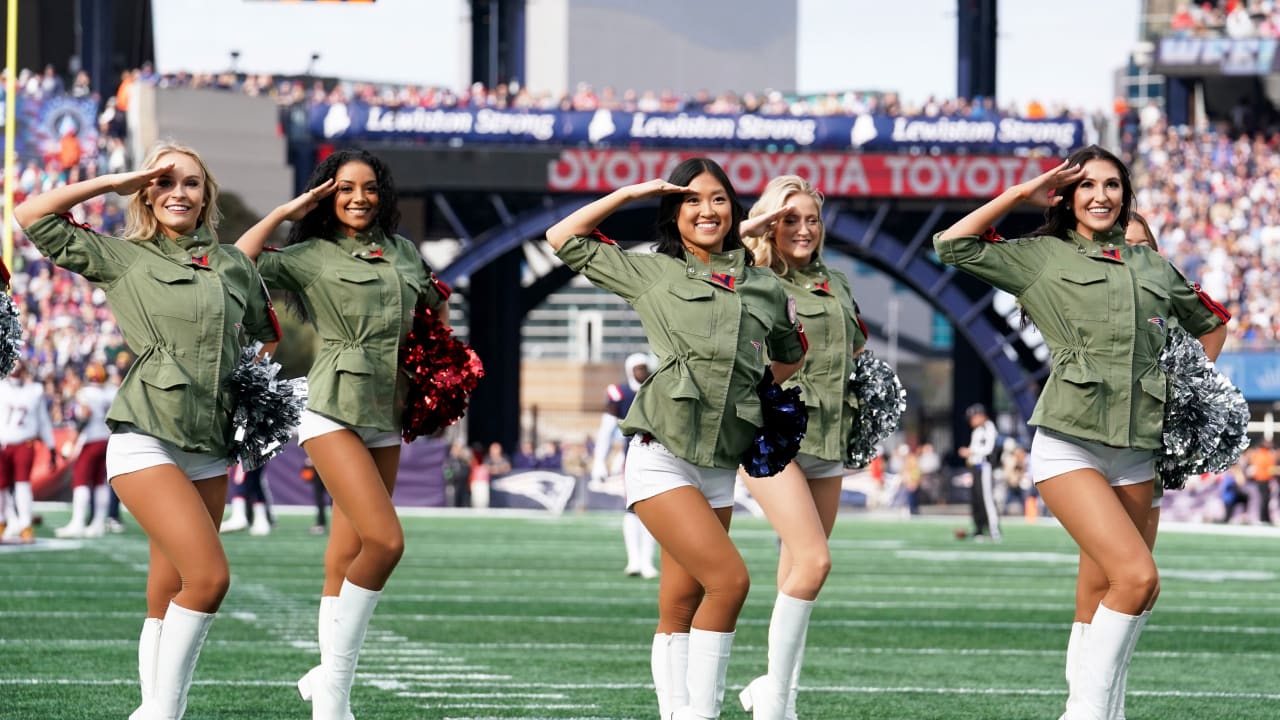Cheerleaders Perform During Patriots - Commanders Game