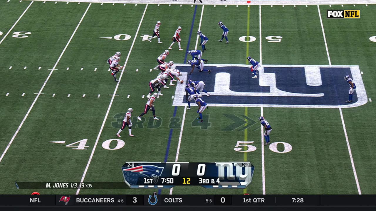 Ezekiel Elliott shoulder-charges a man before lunging for first-down pickup