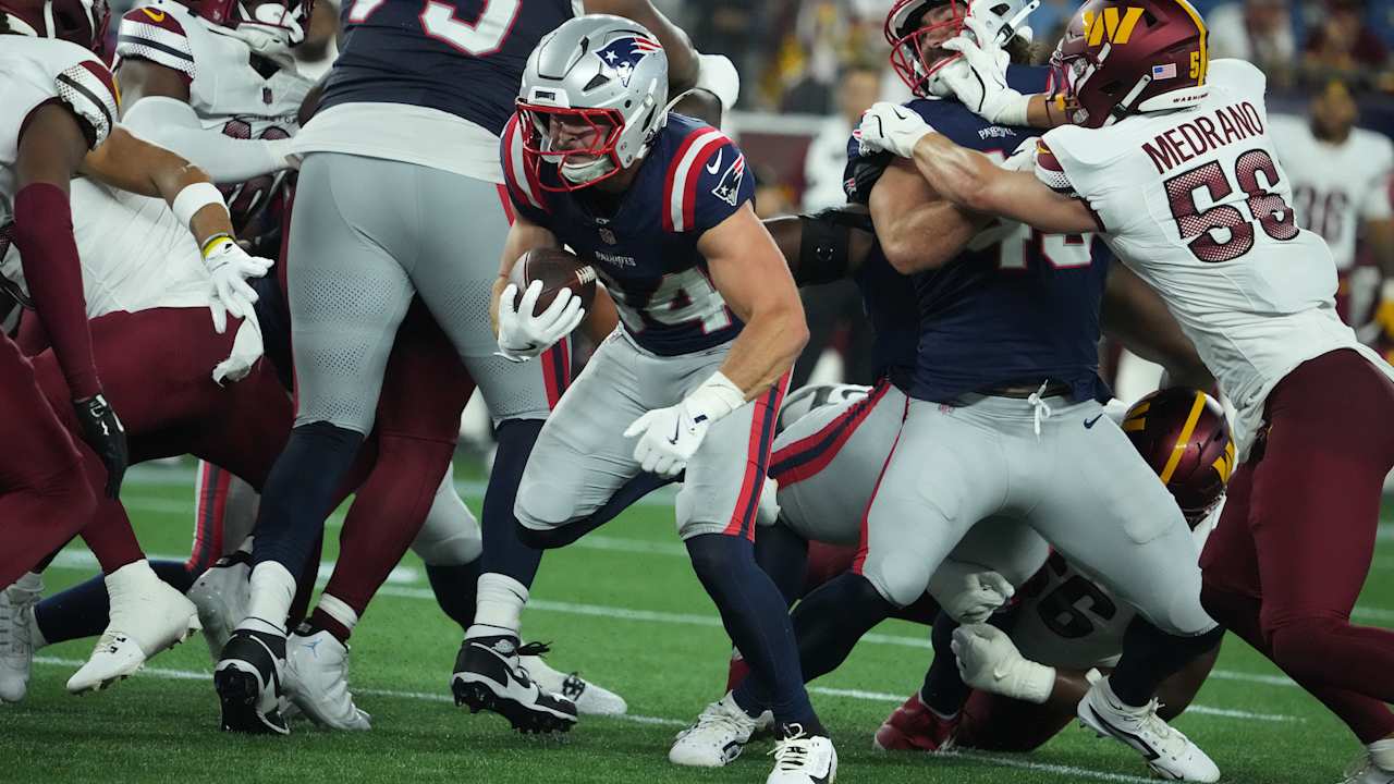 Lan Larison rushes for a 2-yard touchdown vs. Washington Commanders