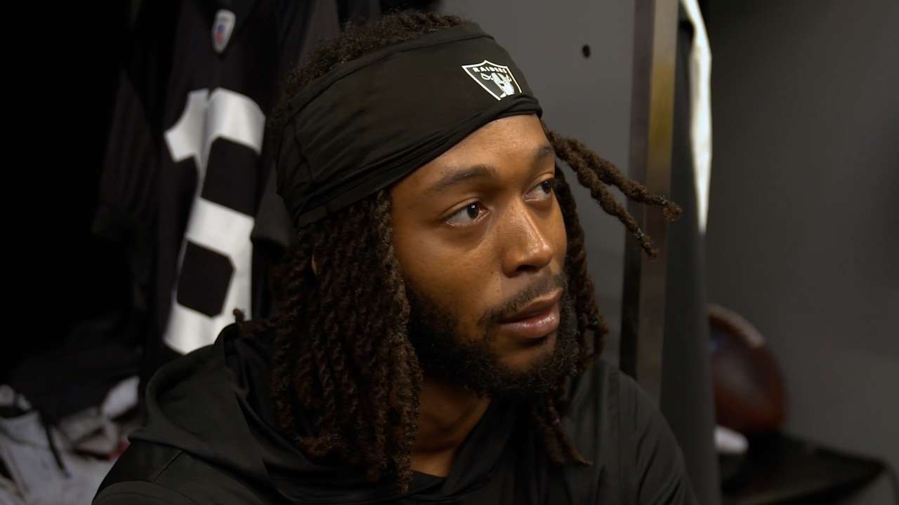 Meyers, Koonce, Kelly, Powers-Johnson and Laulu address the media ...