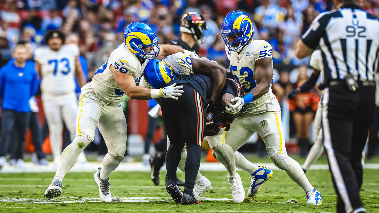 Los Angeles Rams rookie outside linebacker Byron Young contains a ...