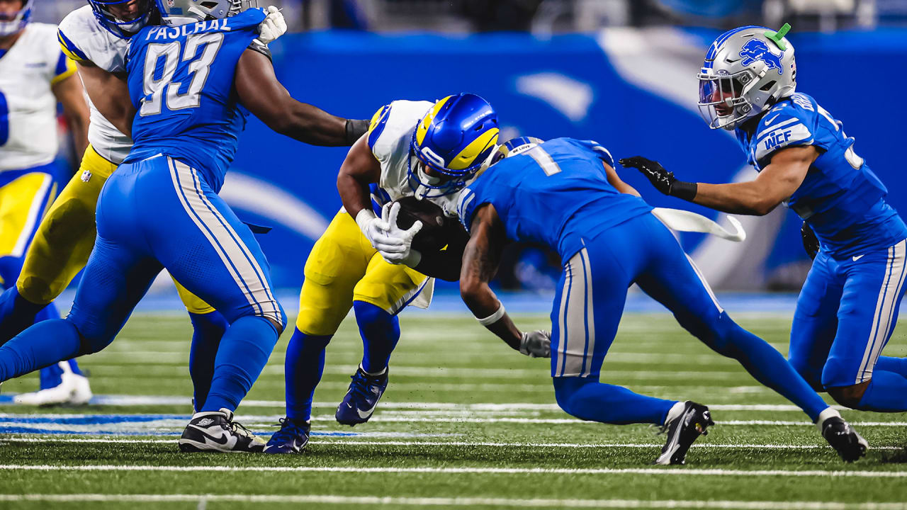 Ronnie Rivers runs over a Lions defender en route to a first down ...