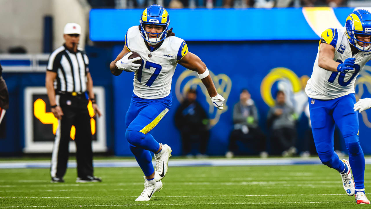 Los Angeles Rams wide receiver Puka Nacua takes a handoff around the ...