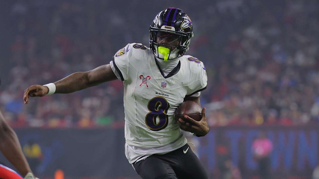 Lamar Jackson Reacts to Breaking Michael Vick's Rushing Record