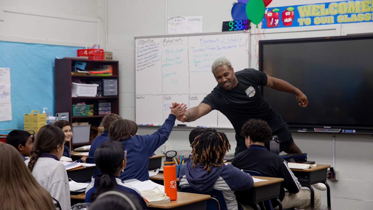 Photos: Cam Jordan visits J.C. Ellis Elementary School