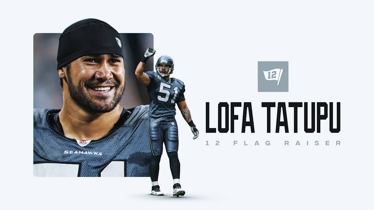 PHOTOS: Lofa Tatupu Raises The 12 Flag Before The Seahawks Face The Bills