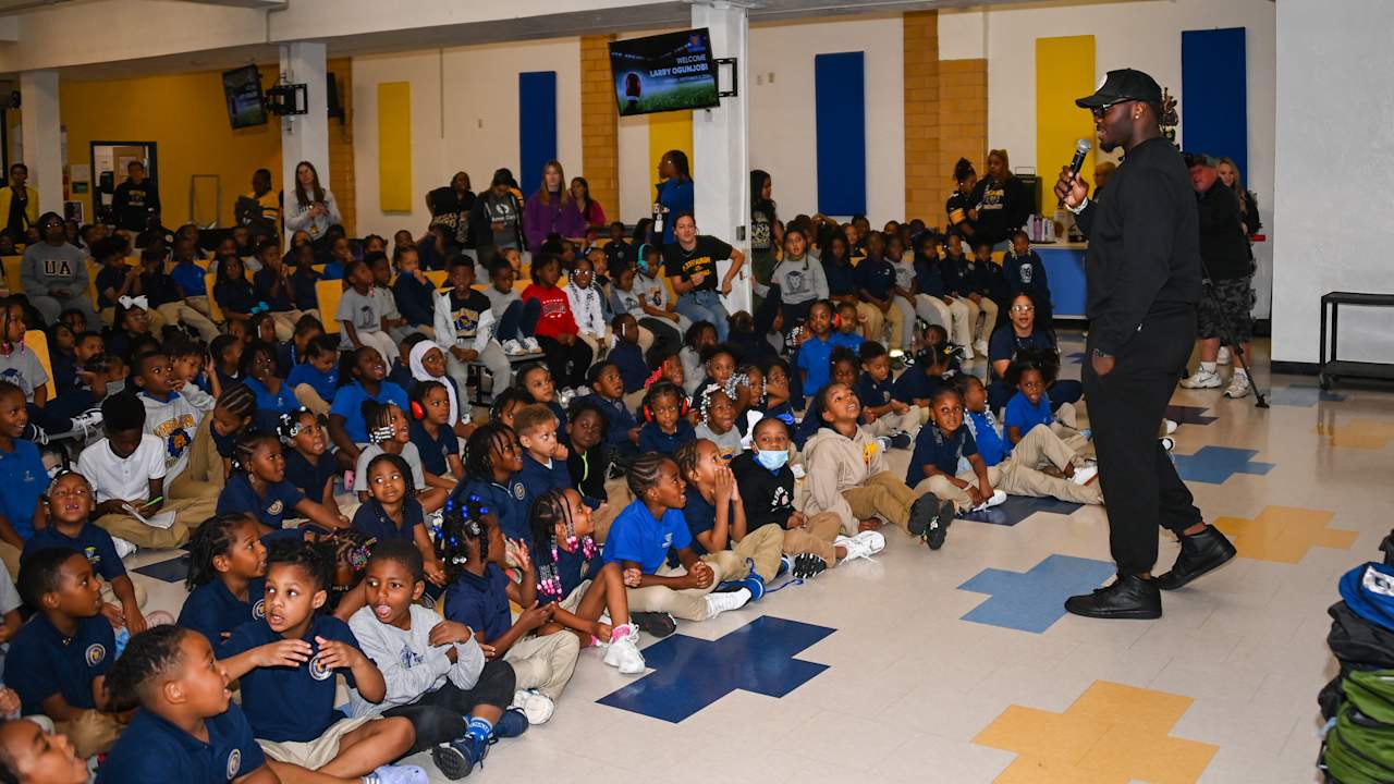 PHOTOS: Larry Ogunjobi in the community