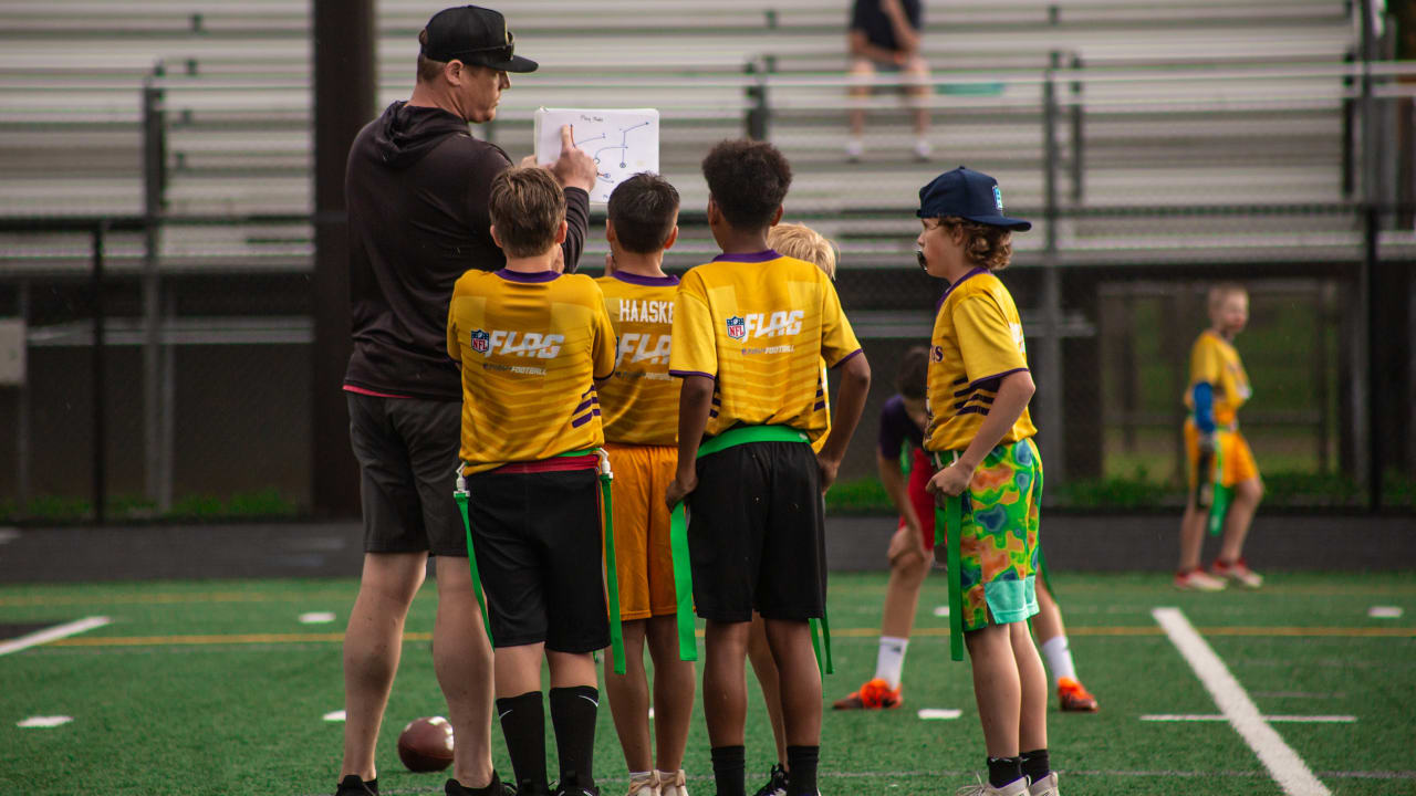 Brian Flores and Chris Kuper Coach Flag Football Team